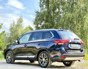 Blue Mitsubishi Outlander 2016 in Siauliai, with an engine capacity of 2.27 L and mileage of 151 thousand km for 13999 €, photo 4 on AUTOMOTO.COM.LV