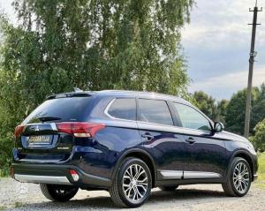 Blue Mitsubishi Outlander 2016 in Siauliai, with an engine capacity of 2.27 L and mileage of 151 thousand km for 13999 €, photo 5 on AUTOMOTO.COM.LV