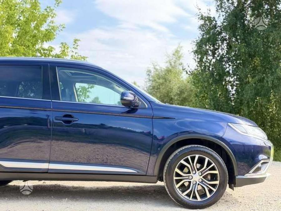 Blue Mitsubishi Outlander 2016 in Siauliai, with an engine capacity of 2.27 L and mileage of 151 thousand km for 13999 €, photo 11 on AUTOMOTO.COM.LV