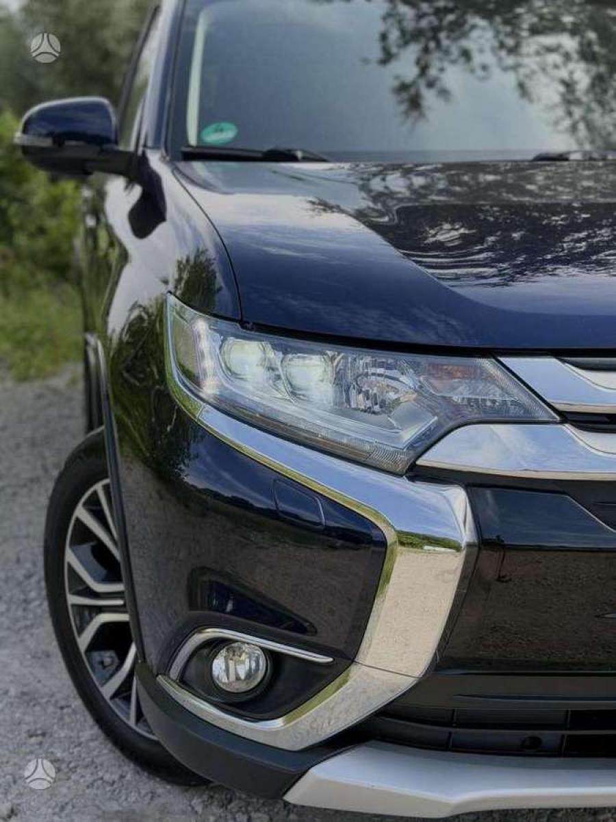 Blue Mitsubishi Outlander 2016 in Siauliai, with an engine capacity of 2.27 L and mileage of 151 thousand km for 13999 €, photo 18 on AUTOMOTO.COM.LV