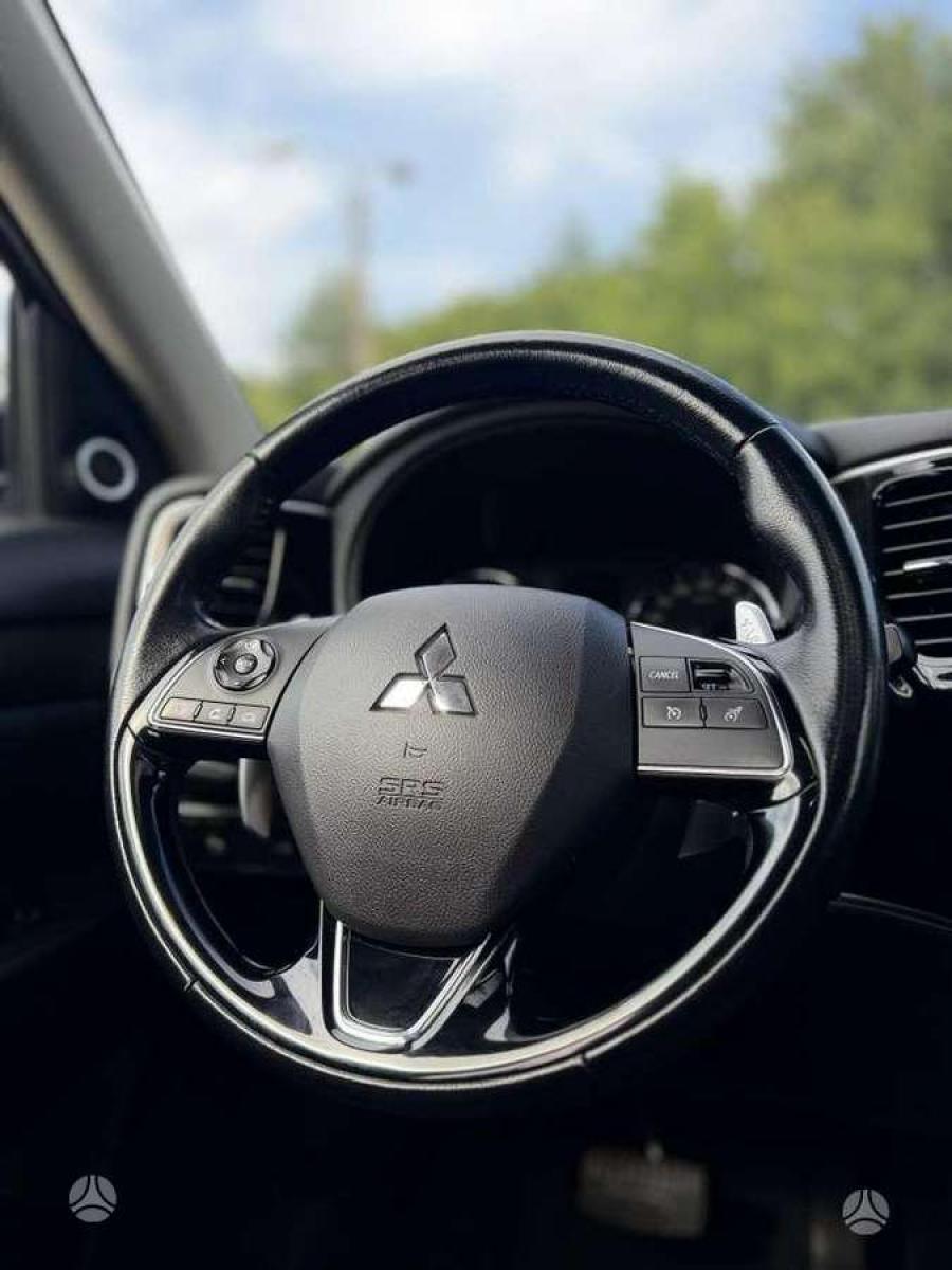 Blue Mitsubishi Outlander 2016 in Siauliai, with an engine capacity of 2.27 L and mileage of 151 thousand km for 13999 €, photo 26 on AUTOMOTO.COM.LV