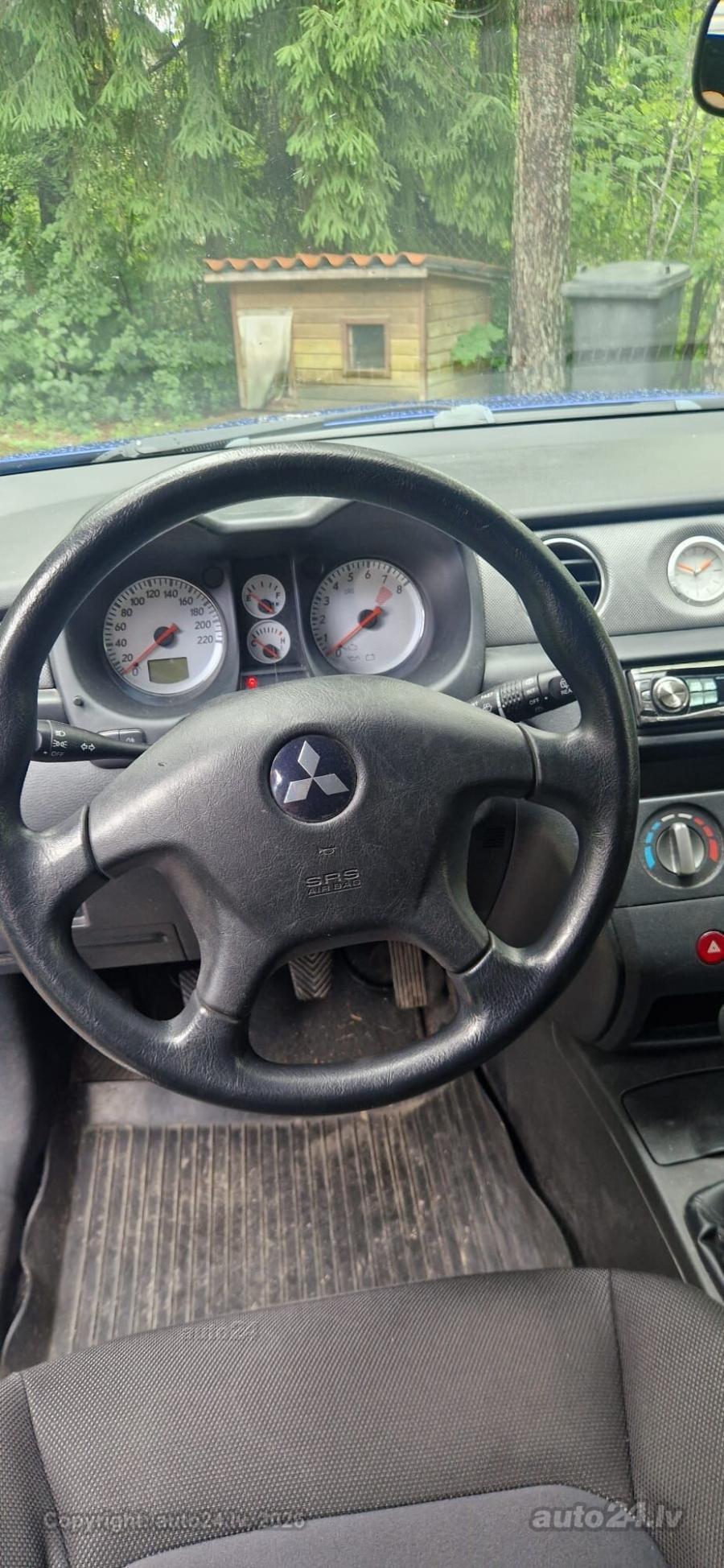 Zils Mitsubishi Outlander 2006 Tallina, ar dzinēja tilpumu 2.00 L un nobraukumu 98 tūkst. km par 5500 €, foto 6 vietnē AUTOMOTO.COM.LV