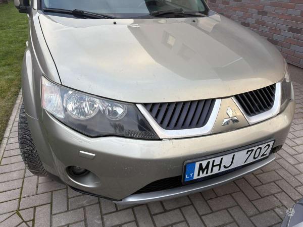 Brown Mitsubishi Outlander 2008 in Marijampole, with an engine capacity of 1.97 L and mileage of 254 thousand km for 2450 €, photo 1 on AUTOMOTO.COM.LV