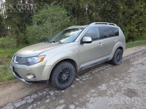 Brūns Mitsubishi Outlander 2008 Rīga, ar dzinēja tilpumu 2.40 L un nobraukumu 284 tūkst. km par 3550 €, foto  vietnē AUTOMOTO.COM.LV
