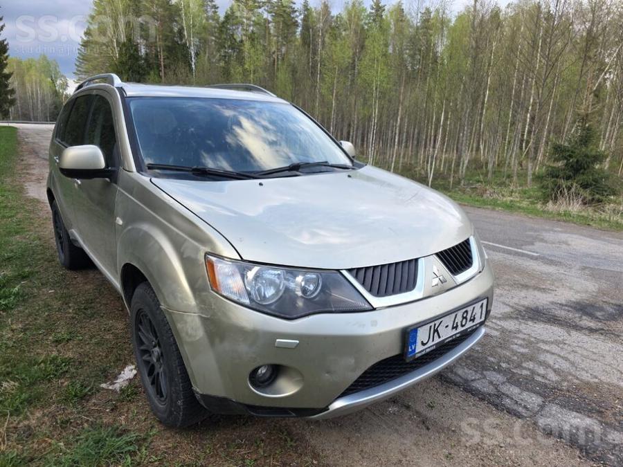 Brūns Mitsubishi Outlander 2008 Rīga, ar dzinēja tilpumu 2.40 L un nobraukumu 284 tūkst. km par 3550 €, foto 3 vietnē AUTOMOTO.COM.LV