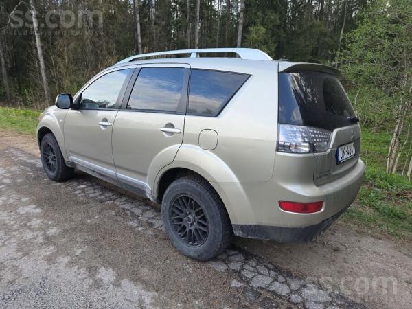 Brūns Mitsubishi Outlander 2008 Rīga, ar dzinēja tilpumu 2.40 L un nobraukumu 284 tūkst. km par 3550 €, foto 3 vietnē AUTOMOTO.COM.LV
