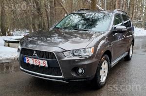 Brūns Mitsubishi Outlander 2010 Rīga, ar dzinēja tilpumu 2.20 L un nobraukumu 219 tūkst. km par 5200 €, foto  vietnē AUTOMOTO.COM.LV