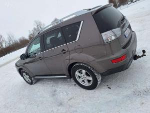 Brown Mitsubishi Outlander 2010 in Marijampole, with an engine capacity of 2.18 L and mileage of 262 thousand km for 3999 €, photo 5 on AUTOMOTO.COM.LV