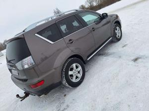 Brown Mitsubishi Outlander 2010 in Marijampole, with an engine capacity of 2.18 L and mileage of 262 thousand km for 3999 €, photo 7 on AUTOMOTO.COM.LV