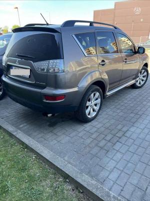 Brūns Mitsubishi Outlander 2010 Kauņa, ar dzinēja tilpumu 2.27 L un nobraukumu 270 tūkst. km par 3600 €, foto 3 vietnē AUTOMOTO.COM.LV