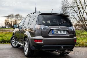Brown Mitsubishi Outlander 2011 in Riga, with an engine capacity of 2.20 L and mileage of 379 thousand km for 5590 €, photo 6 on AUTOMOTO.COM.LV