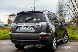 Brown Mitsubishi Outlander 2011 in Riga, with an engine capacity of 2.20 L and mileage of 379 thousand km for 5590 €, photo 7 on AUTOMOTO.COM.LV