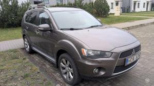 Brūns Mitsubishi Outlander 2011 Kauņa, ar dzinēja tilpumu 2.36 L un nobraukumu 208 tūkst. km par 2000 €, foto  vietnē AUTOMOTO.COM.LV