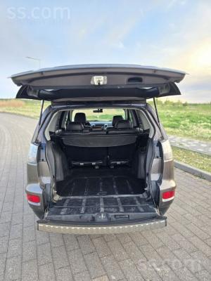 Brūns Mitsubishi Outlander 2011 Rīga, ar dzinēja tilpumu 2.40 L un nobraukumu 319 tūkst. km par 1450 €, foto 6 vietnē AUTOMOTO.COM.LV