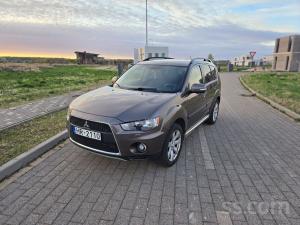 Brūns Mitsubishi Outlander 2011 Rīga, ar dzinēja tilpumu 2.40 L un nobraukumu 319 tūkst. km par 1450 €, foto 9 vietnē AUTOMOTO.COM.LV