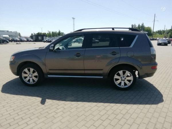 Brown Mitsubishi Outlander 2011 in Marijampole, with an engine capacity of 2.27 L and mileage of 303 thousand km for 4799 €, photo 1 on AUTOMOTO.COM.LV
