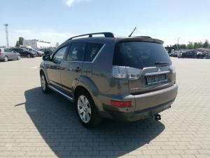 Brown Mitsubishi Outlander 2011 in Marijampole, with an engine capacity of 2.27 L and mileage of 303 thousand km for 4799 €, photo 3 on AUTOMOTO.COM.LV