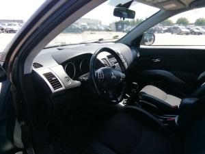 Brown Mitsubishi Outlander 2011 in Marijampole, with an engine capacity of 2.27 L and mileage of 303 thousand km for 4799 €, photo 16 on AUTOMOTO.COM.LV