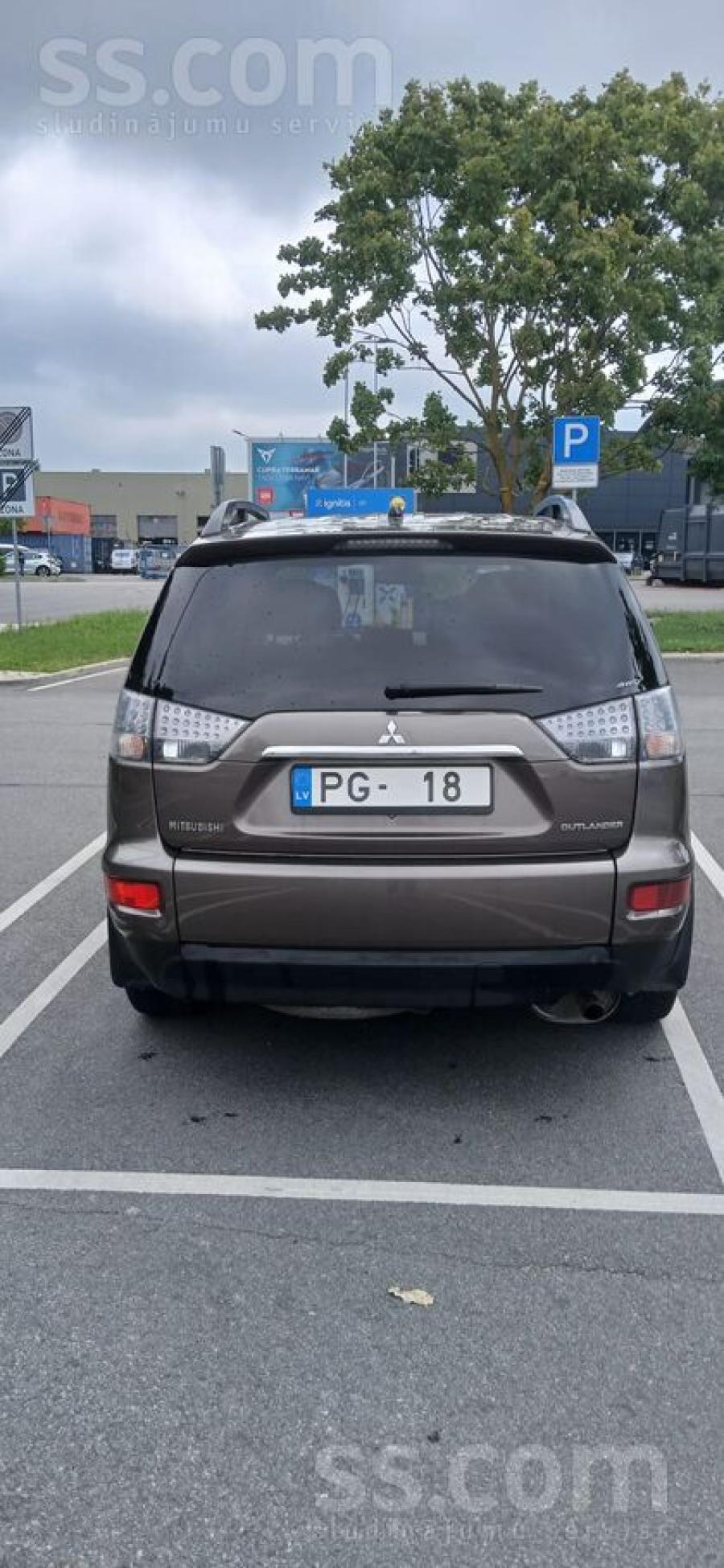 Brown Mitsubishi Outlander 2011 in Riga, with an engine capacity of 2.40 L and mileage of 119 thousand km for 5700 €, photo 4 on AUTOMOTO.COM.LV