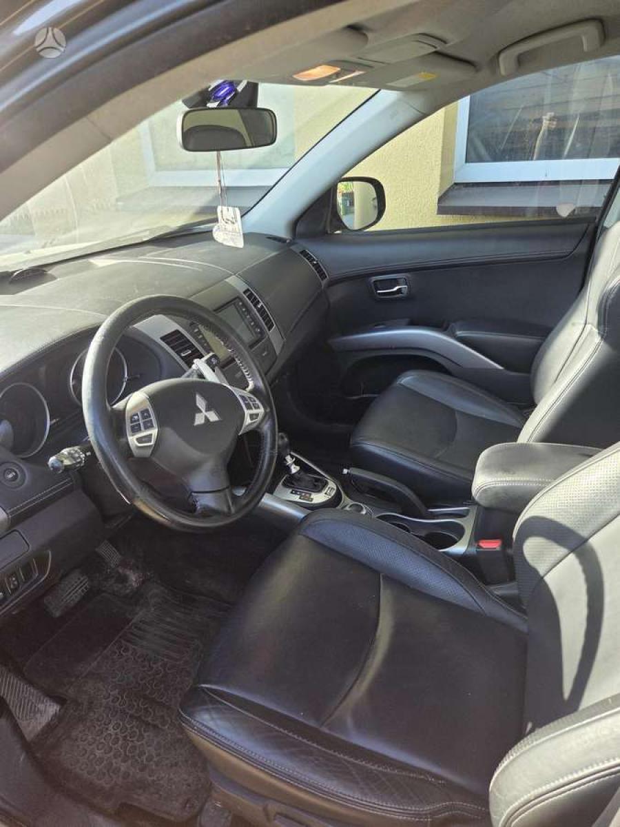 Brūns Mitsubishi Outlander 2011 Kauņa, ar dzinēja tilpumu 2.18 L un nobraukumu 193 tūkst. km par 2500 €, foto 9 vietnē AUTOMOTO.COM.LV