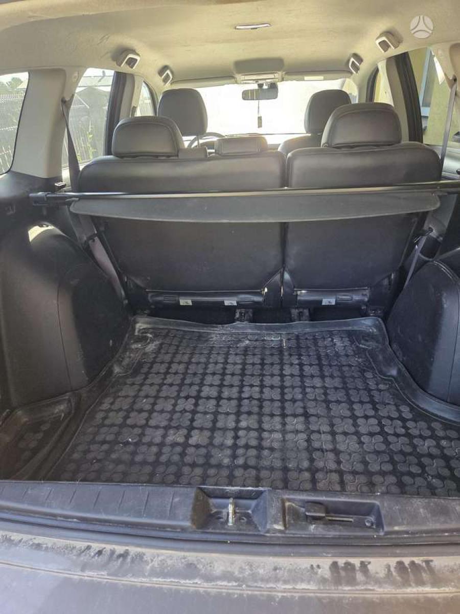 Brūns Mitsubishi Outlander 2011 Kauņa, ar dzinēja tilpumu 2.18 L un nobraukumu 193 tūkst. km par 2500 €, foto 12 vietnē AUTOMOTO.COM.LV
