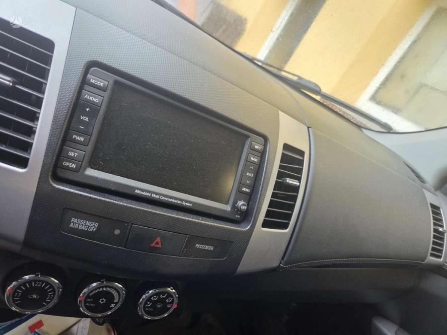 Brūns Mitsubishi Outlander 2011 Kauņa, ar dzinēja tilpumu 2.18 L un nobraukumu 193 tūkst. km par 2500 €, foto 14 vietnē AUTOMOTO.COM.LV
