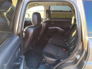 Brown Mitsubishi Outlander 2011 in Siauliai, with an engine capacity of 2.27 L and mileage of 297 thousand km for 5700 €, photo 13 on AUTOMOTO.COM.LV