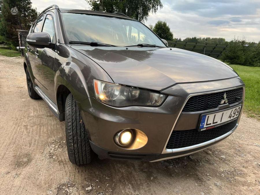 Brūns Mitsubishi Outlander 2011 Viļņa, ar dzinēja tilpumu 2.27 L un nobraukumu 293 tūkst. km par 3500 €, foto 4 vietnē AUTOMOTO.COM.LV
