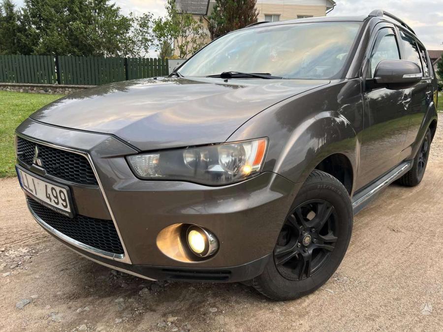 Brūns Mitsubishi Outlander 2011 Viļņa, ar dzinēja tilpumu 2.27 L un nobraukumu 293 tūkst. km par 3500 €, foto 5 vietnē AUTOMOTO.COM.LV