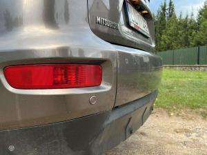 Brūns Mitsubishi Outlander 2011 Viļņa, ar dzinēja tilpumu 2.27 L un nobraukumu 293 tūkst. km par 3500 €, foto 6 vietnē AUTOMOTO.COM.LV