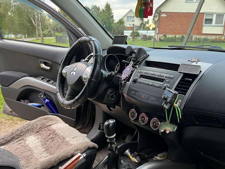 Brūns Mitsubishi Outlander 2011 Viļņa, ar dzinēja tilpumu 2.27 L un nobraukumu 293 tūkst. km par 3500 €, foto 16 vietnē AUTOMOTO.COM.LV