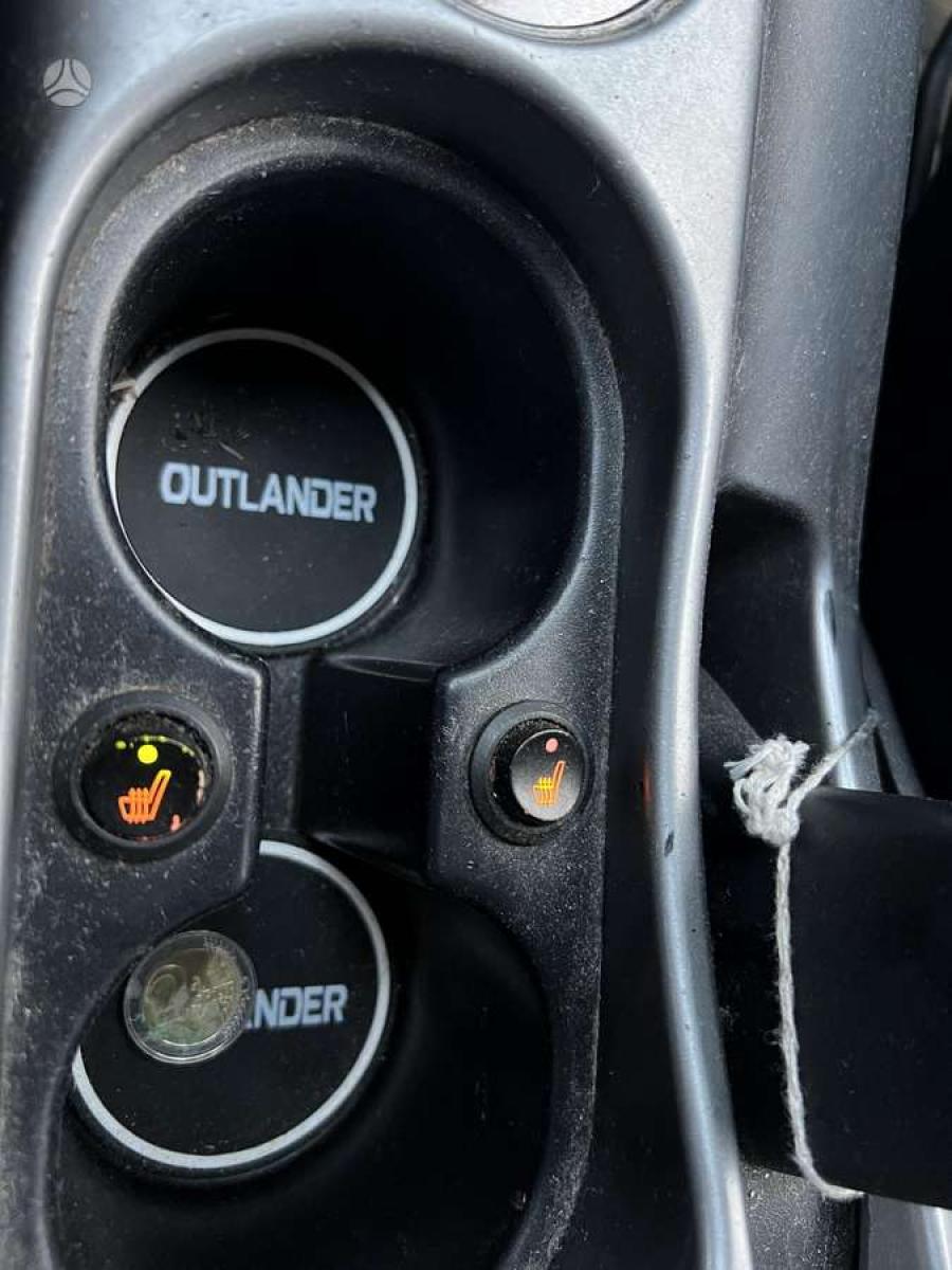 Brūns Mitsubishi Outlander 2011 Viļņa, ar dzinēja tilpumu 2.27 L un nobraukumu 293 tūkst. km par 3500 €, foto 19 vietnē AUTOMOTO.COM.LV