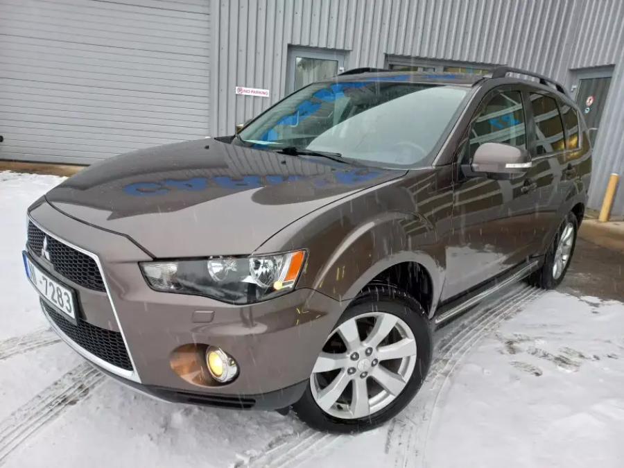 Brown Mitsubishi Outlander 2012 in Riga, with an engine capacity of 2.20 L and mileage of 270 thousand km for 6990 €, photo 1 on AUTOMOTO.COM.LV