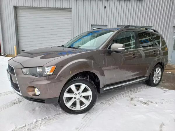 Brūns Mitsubishi Outlander 2012 Rīga, ar dzinēja tilpumu 2.20 L un nobraukumu 270 tūkst. km par 6990 €, foto 2 vietnē AUTOMOTO.COM.LV