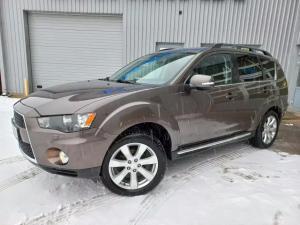 Brown Mitsubishi Outlander 2012 in Riga, with an engine capacity of 2.20 L and mileage of 270 thousand km for 6990 €, photo 3 on AUTOMOTO.COM.LV
