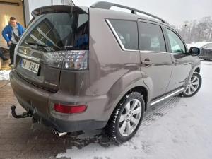 Brown Mitsubishi Outlander 2012 in Riga, with an engine capacity of 2.20 L and mileage of 270 thousand km for 6990 €, photo 4 on AUTOMOTO.COM.LV