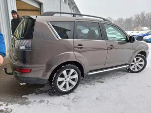 Brown Mitsubishi Outlander 2012 in Riga, with an engine capacity of 2.20 L and mileage of 270 thousand km for 6990 €, photo 5 on AUTOMOTO.COM.LV