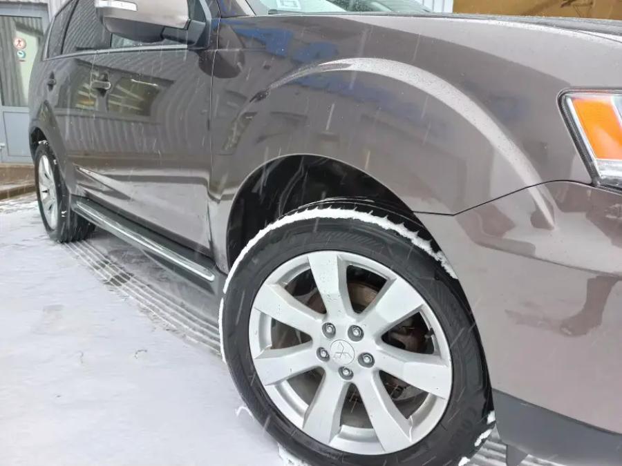 Brown Mitsubishi Outlander 2012 in Riga, with an engine capacity of 2.20 L and mileage of 270 thousand km for 6990 €, photo 12 on AUTOMOTO.COM.LV