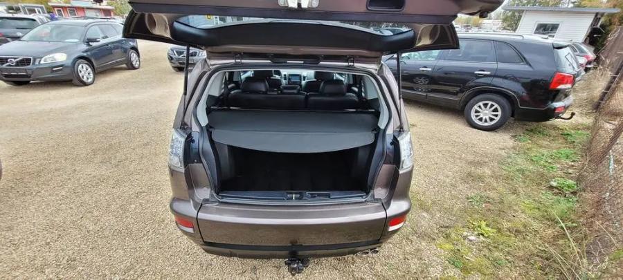 Brown Mitsubishi Outlander 2012 in Riga, with an engine capacity of 2.20 L and mileage of 226 thousand km for 6500 €, photo 18 on AUTOMOTO.COM.LV