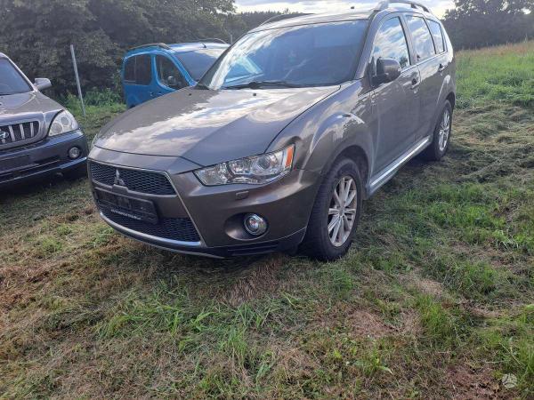 Brūns Mitsubishi Outlander 2012 Tauragė, ar dzinēja tilpumu 2.20 L un nobraukumu 264 tūkst. km par 3150 €, foto 2 vietnē AUTOMOTO.COM.LV
