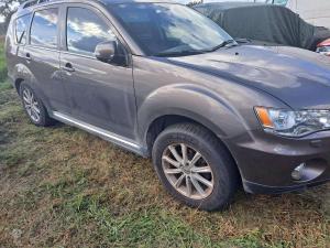 Brūns Mitsubishi Outlander 2012 Tauragė, ar dzinēja tilpumu 2.20 L un nobraukumu 264 tūkst. km par 3150 €, foto 5 vietnē AUTOMOTO.COM.LV