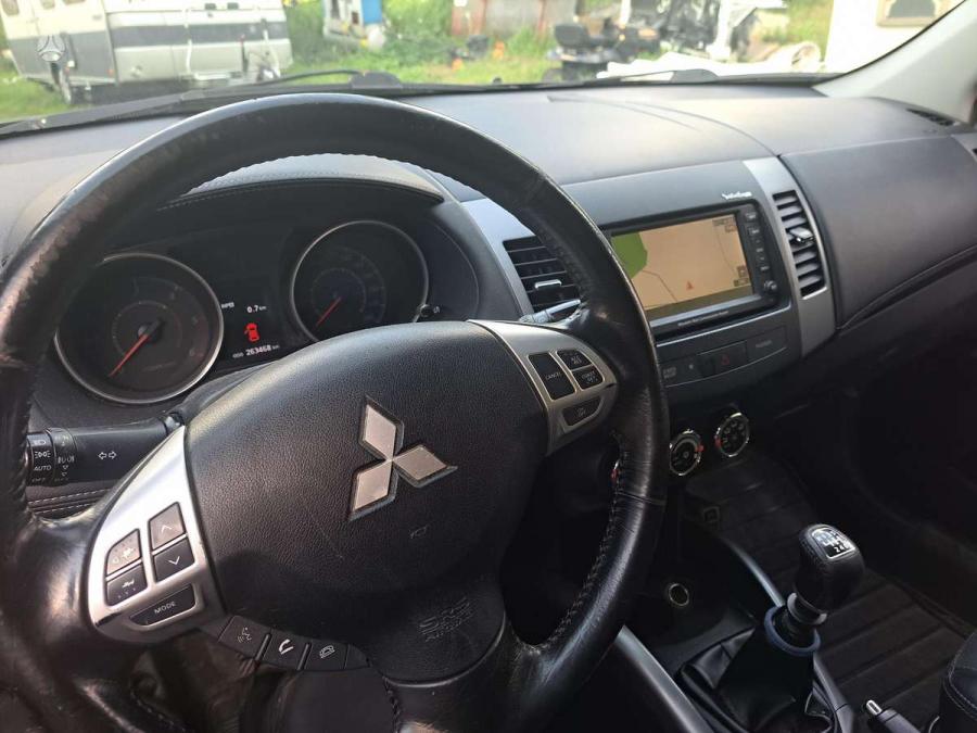 Brūns Mitsubishi Outlander 2012 Tauragė, ar dzinēja tilpumu 2.20 L un nobraukumu 264 tūkst. km par 3150 €, foto 13 vietnē AUTOMOTO.COM.LV