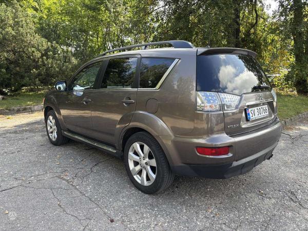Brūns Mitsubishi Outlander 2012 Panevēža, ar dzinēja tilpumu 2.27 L un nobraukumu 230 tūkst. km par 3800 €, foto 6 vietnē AUTOMOTO.COM.LV