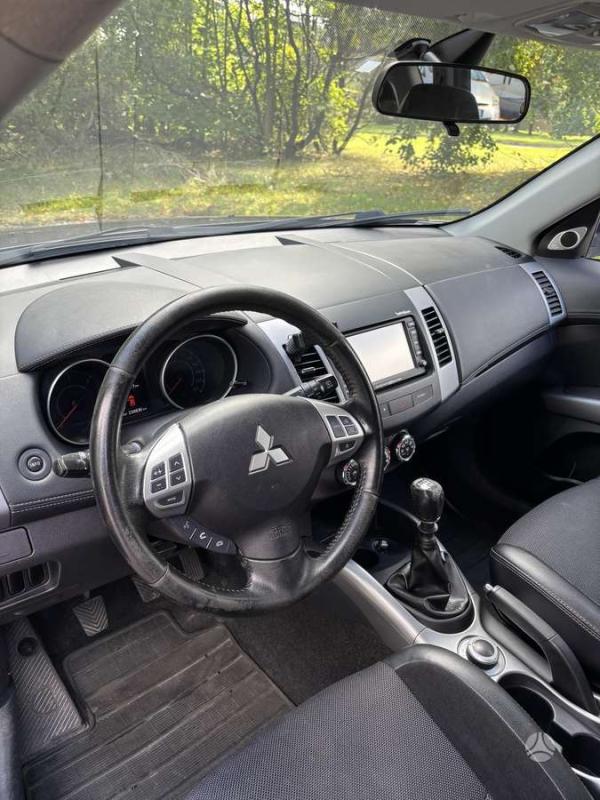 Brūns Mitsubishi Outlander 2012 Panevēža, ar dzinēja tilpumu 2.27 L un nobraukumu 230 tūkst. km par 3800 €, foto 10 vietnē AUTOMOTO.COM.LV
