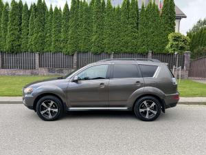 Brown Mitsubishi Outlander 2012 in Vilnius, with an engine capacity of 2.18 L and mileage of 262 thousand km for 4499 €, photo 3 on AUTOMOTO.COM.LV