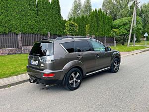 Brown Mitsubishi Outlander 2012 in Vilnius, with an engine capacity of 2.18 L and mileage of 262 thousand km for 4499 €, photo 5 on AUTOMOTO.COM.LV