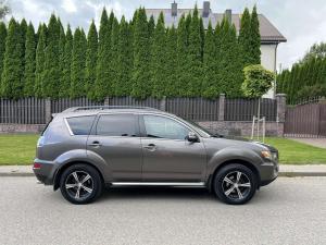 Brown Mitsubishi Outlander 2012 in Vilnius, with an engine capacity of 2.18 L and mileage of 262 thousand km for 4499 €, photo 6 on AUTOMOTO.COM.LV