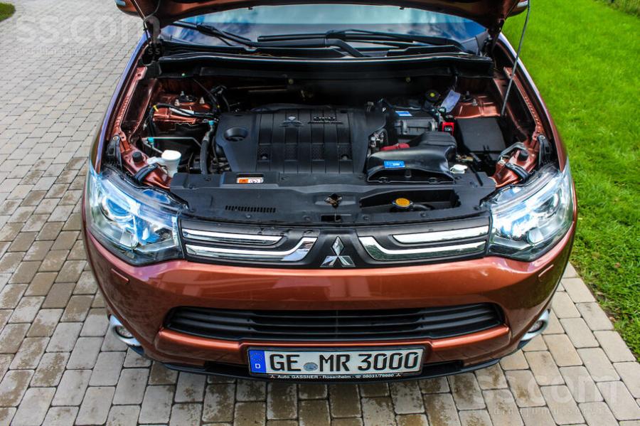 Brown Mitsubishi Outlander 2012 in Jelgava, with an engine capacity of 2.20 L and mileage of 221 thousand km for 7996 €, photo 23 on AUTOMOTO.COM.LV