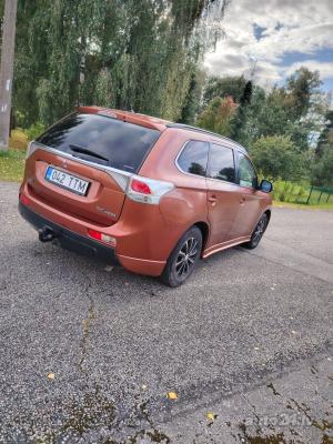 Brūns Mitsubishi Outlander 2012 Paide, ar dzinēja tilpumu 2.30 L un nobraukumu 290 tūkst. km par 8000 €, foto 5 vietnē AUTOMOTO.COM.LV