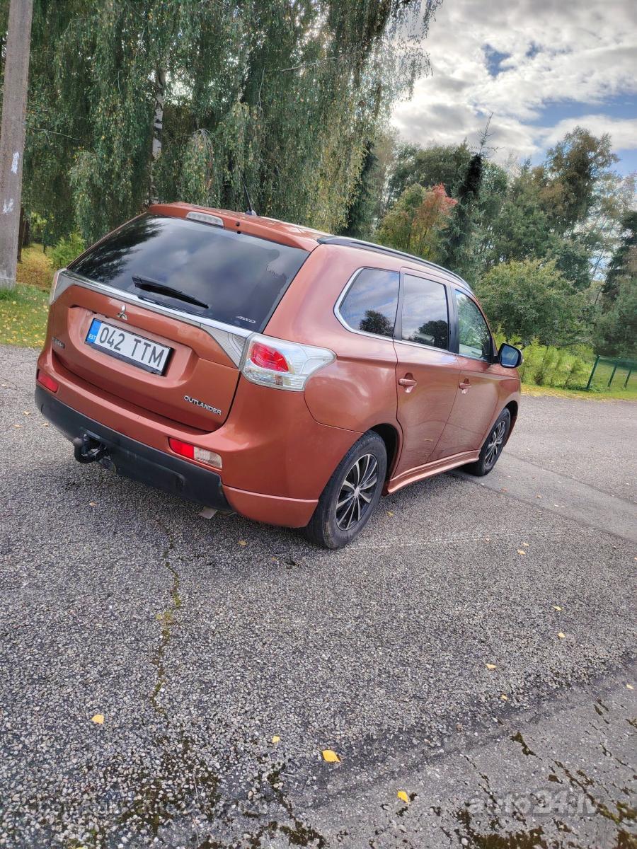 Brūns Mitsubishi Outlander 2012 Paide, ar dzinēja tilpumu 2.30 L un nobraukumu 290 tūkst. km par 8000 €, foto 5 vietnē AUTOMOTO.COM.LV